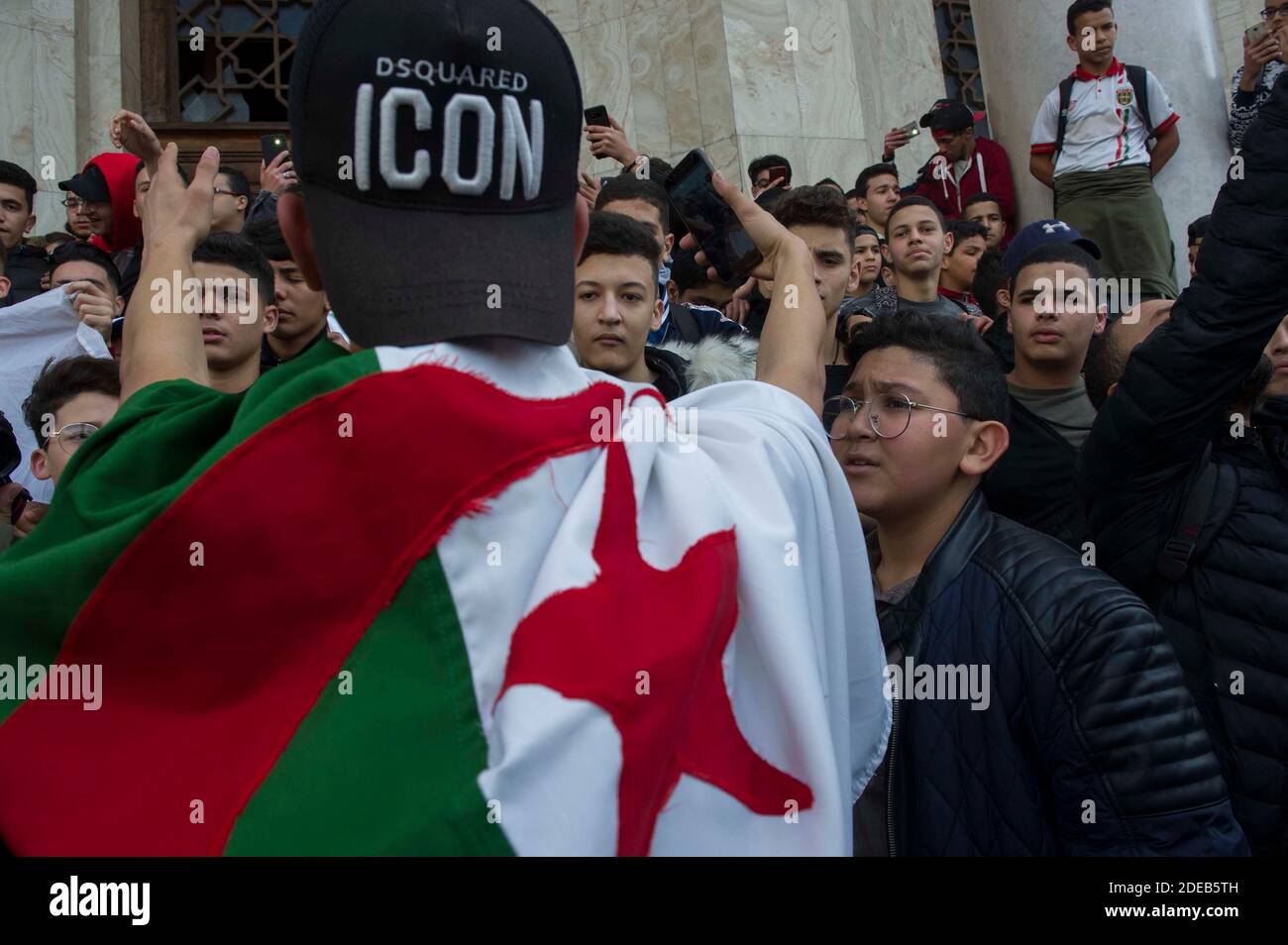 Algerian High School students shout slogans as they demonstrate with ...