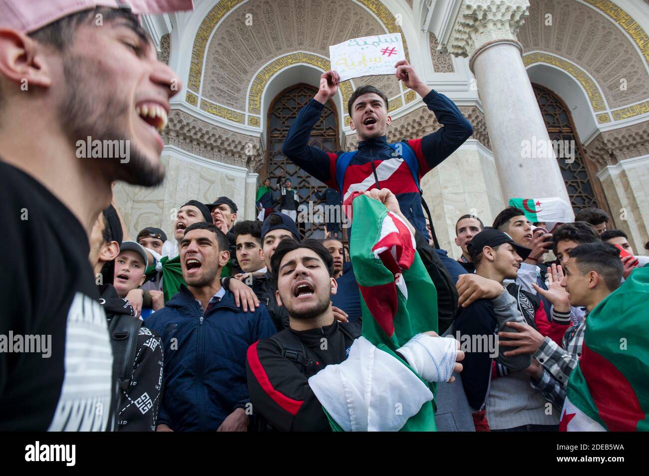 Algerian High School students shout slogans as they demonstrate with ...