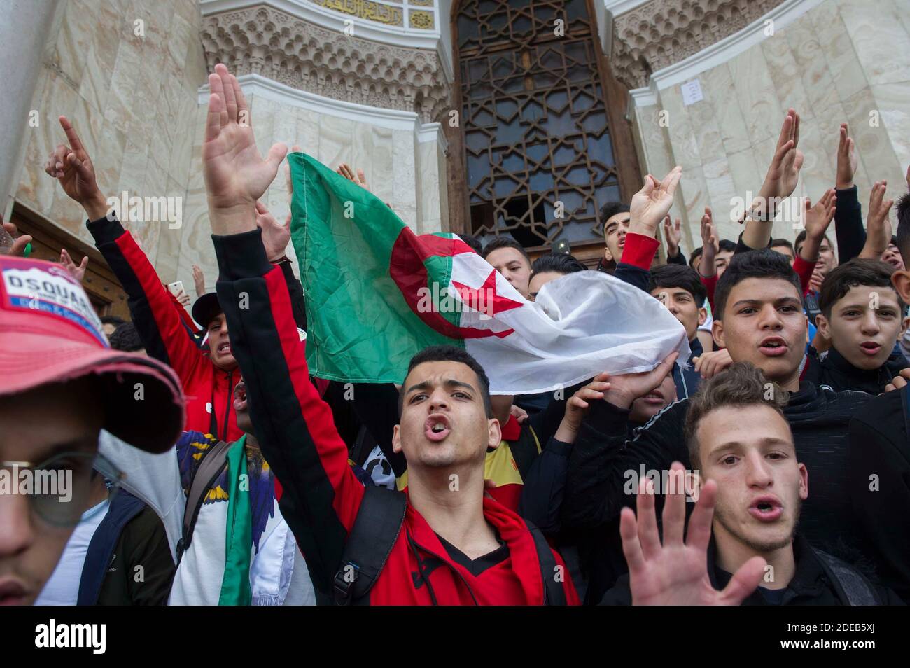 Algerian High School students shout slogans as they demonstrate with ...