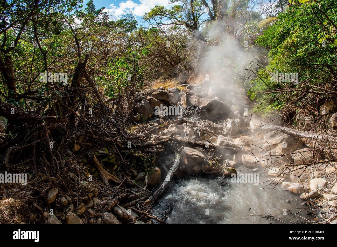 Bubbling mud pits and volcanic fumaroles seen at Volcano Rincon de la ...