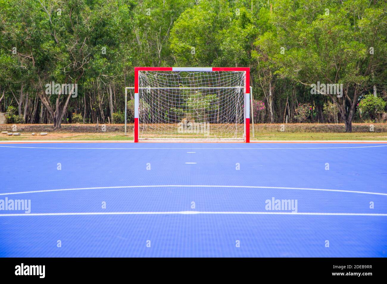 view of blue soccer field or football field Stock Photo - Alamy