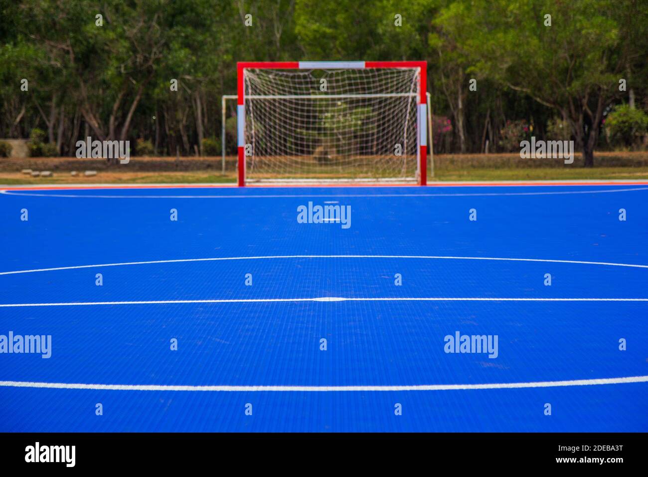 view of blue soccer field or football field Stock Photo - Alamy