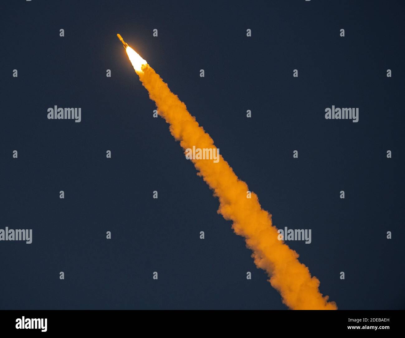 A United Launch Alliance (ULA) Atlas V rocket is pictured streaking ...