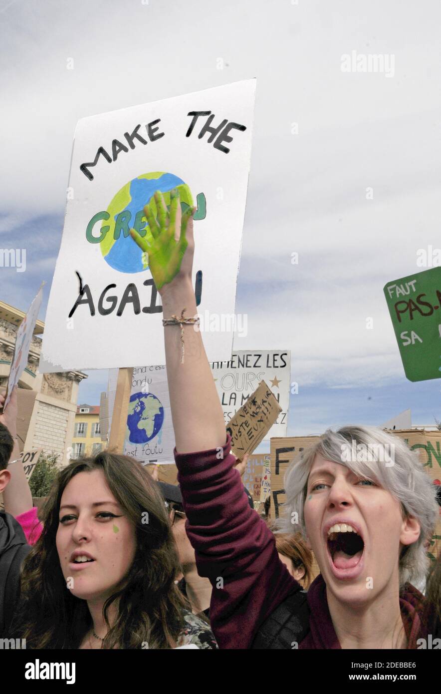 Youth hold banners during a demonstration against climate change on ...