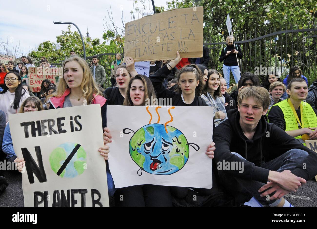Youth hold banners during a demonstration against climate change on ...