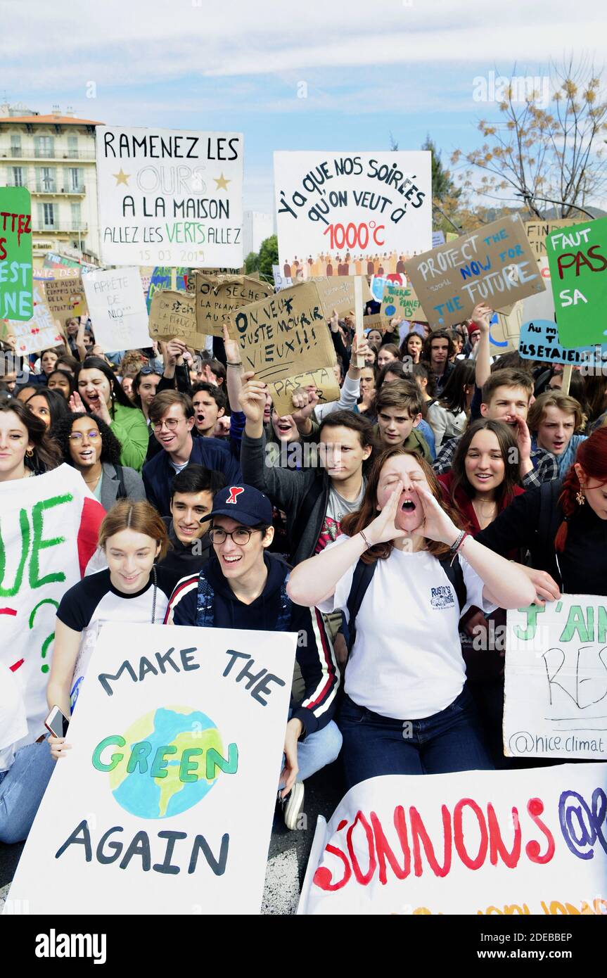 Youth hold banners during a demonstration against climate change on ...