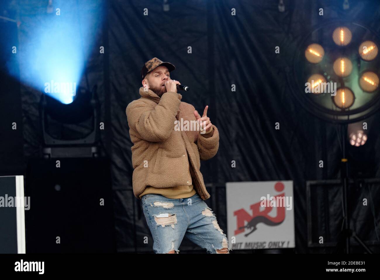 Singer Kevin Bonnet aka Keen'V performs live on stage for launching of ...
