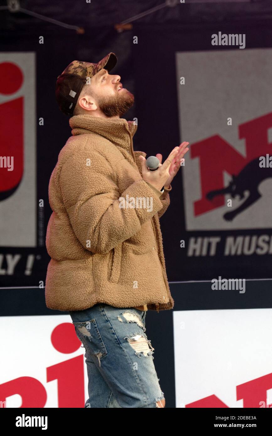Singer Kevin Bonnet aka Keen'V performs live on stage for launching of ...
