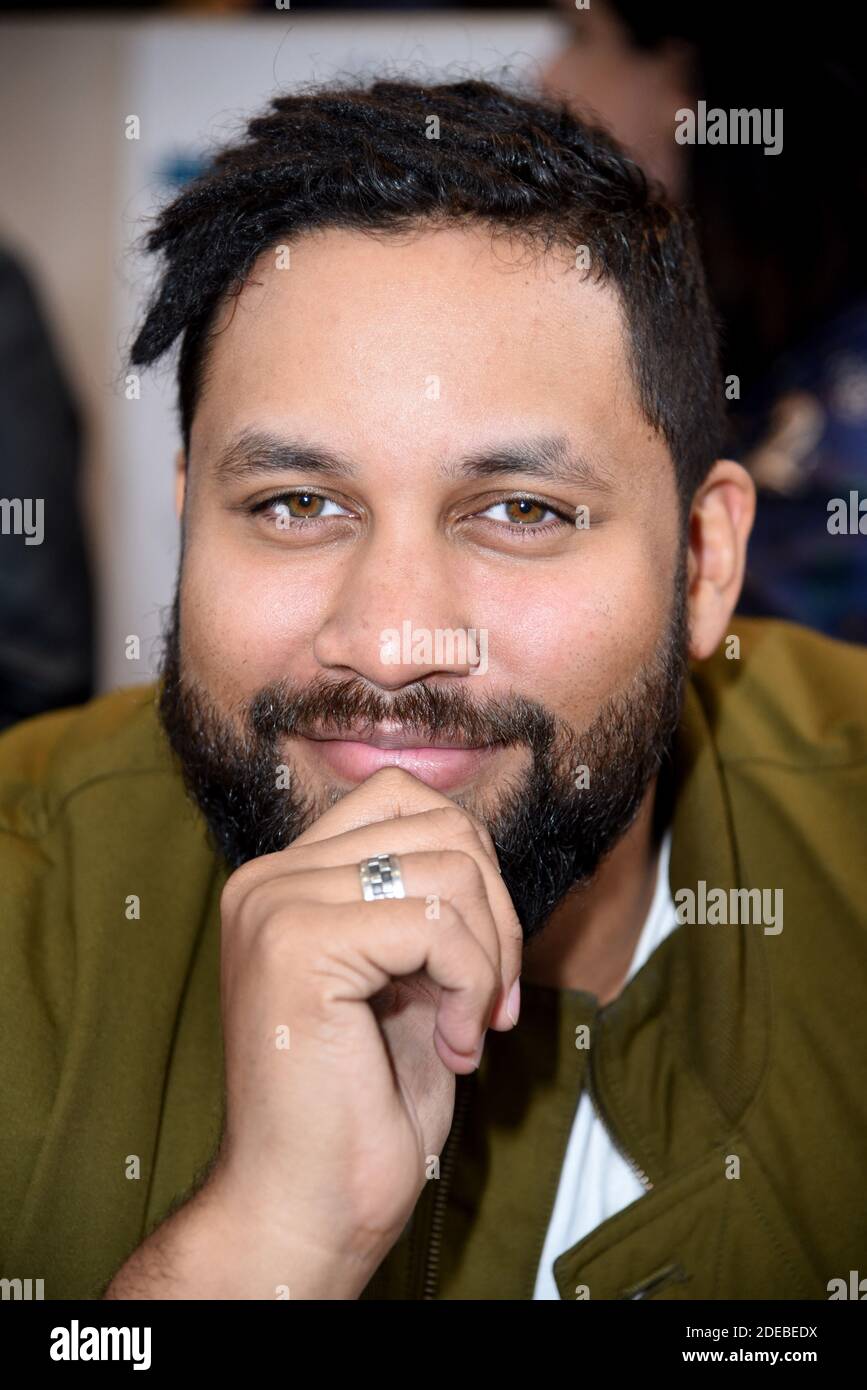 Kevin Razy signs his book at The Book Fair in Paris, France on March 16 ...