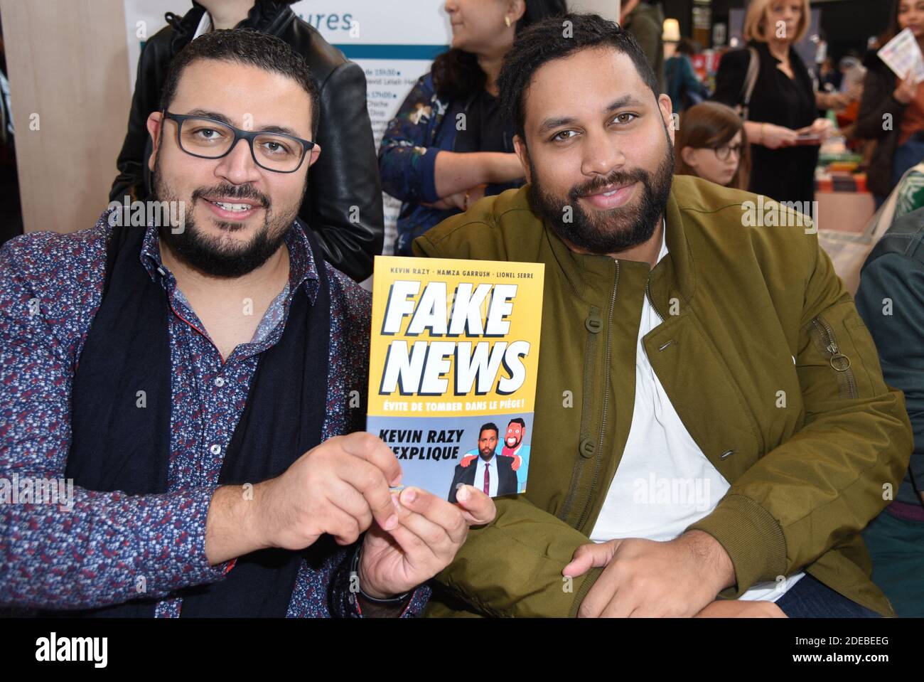 Kevin Razy signs his book at The Book Fair in Paris, France on March 16 ...