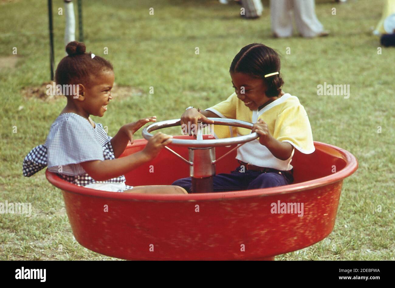 Children playing in the park that is near the U.S.S. Constitution in ...