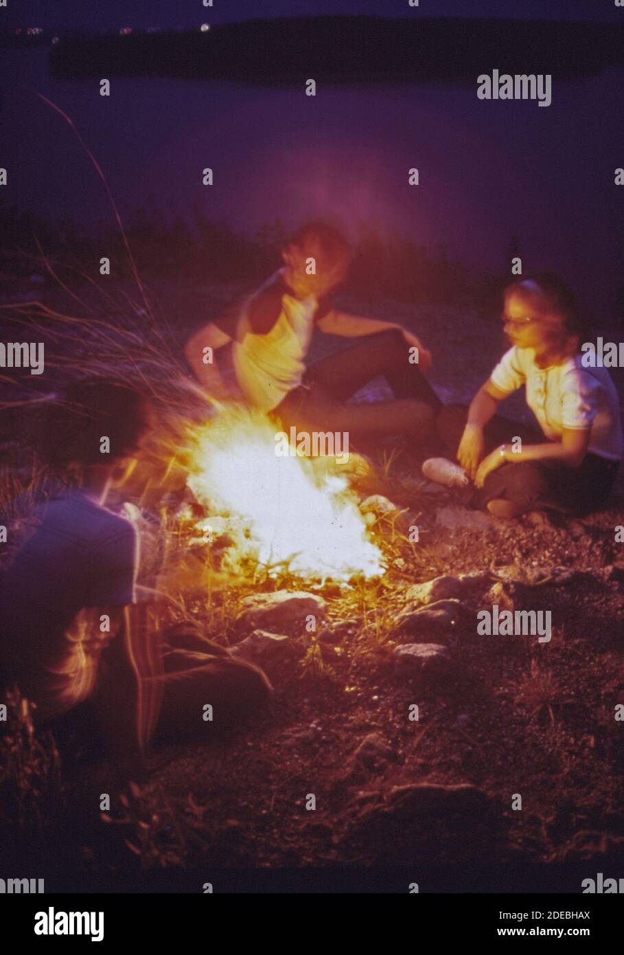 High school students around campfire hi-res stock photography and ...