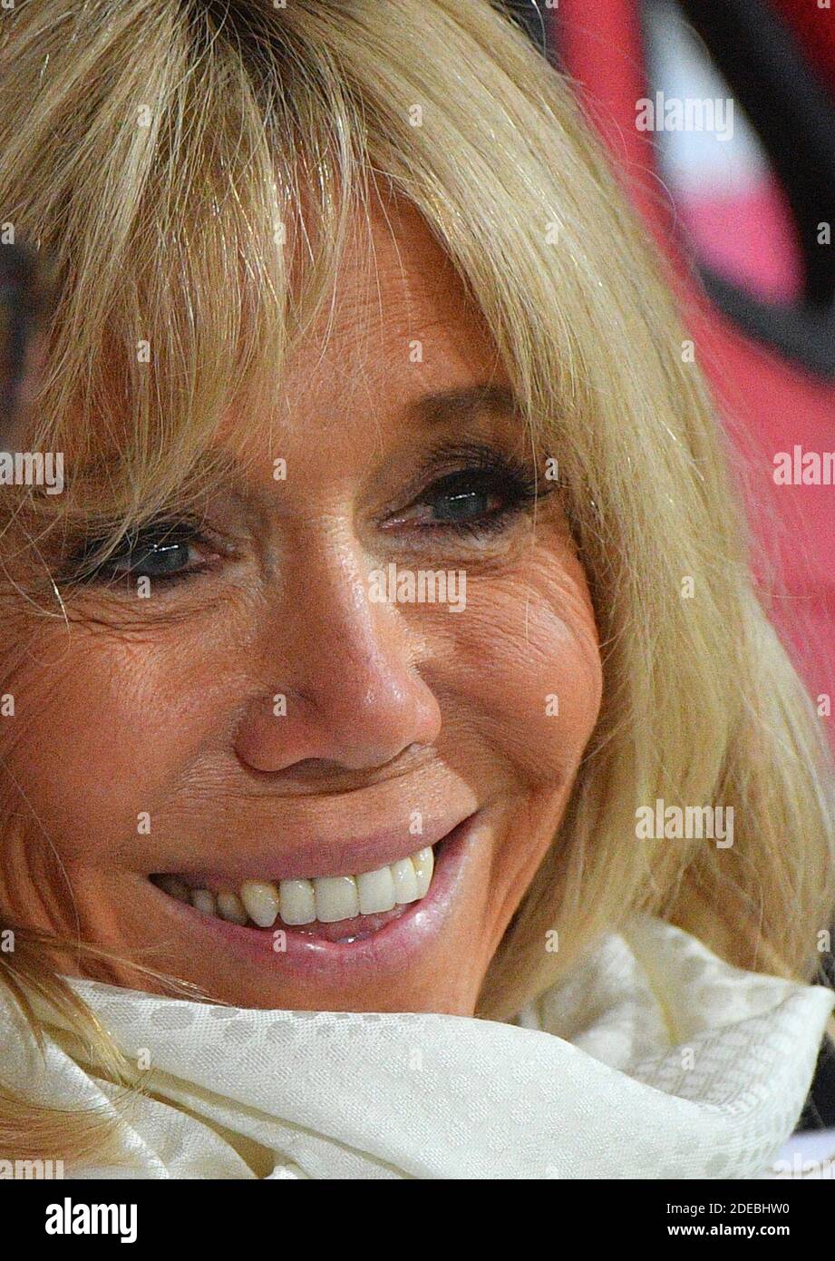 First Lady Brigitte Macron is seen on the pitch before the charity ...
