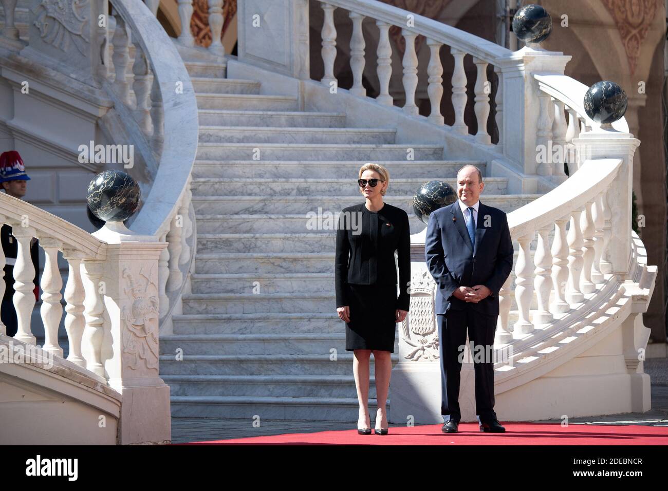 Prince Albert II of Monaco and his wife Princess Charlene wait for ...