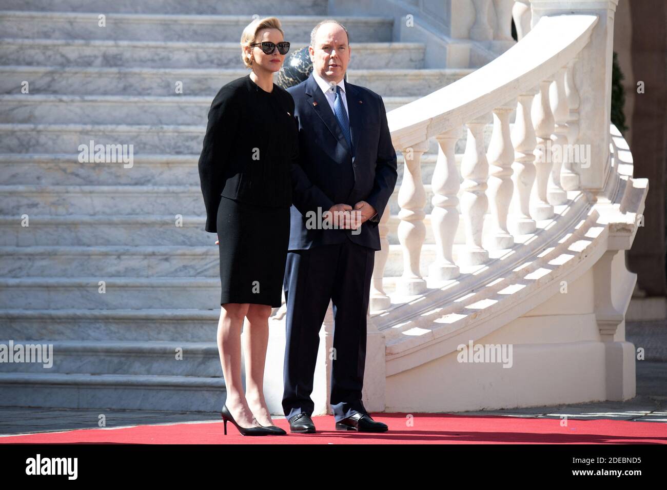 Prince Albert II of Monaco and his wife Princess Charlene wait for ...