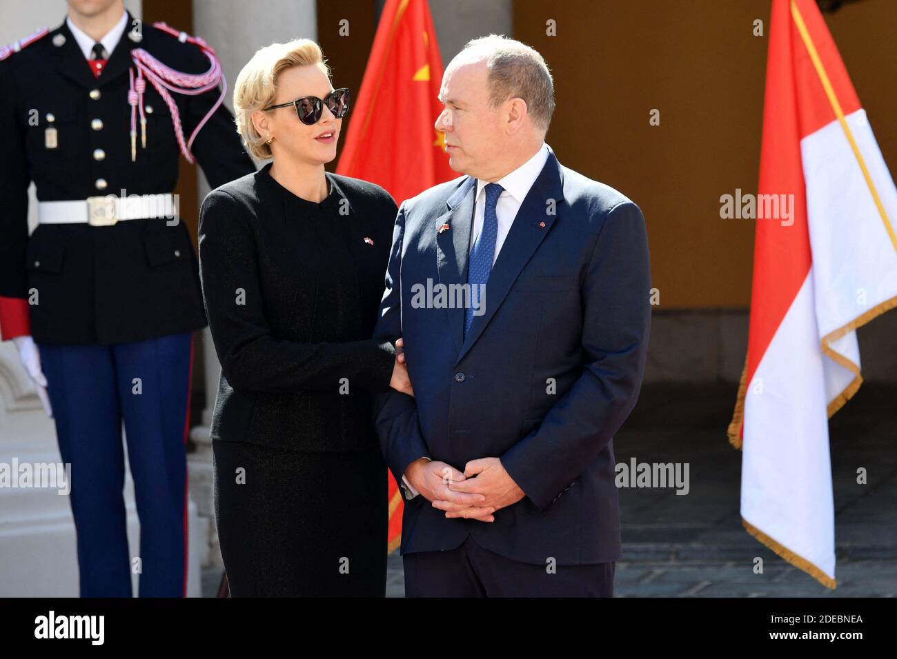 Prince Albert II of Monaco and his wife Princess Charlene wait for ...