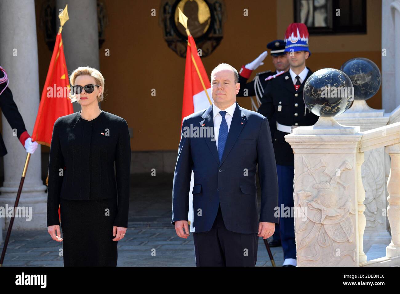 Prince Albert II of Monaco and his wife Princess Charlene wait for ...