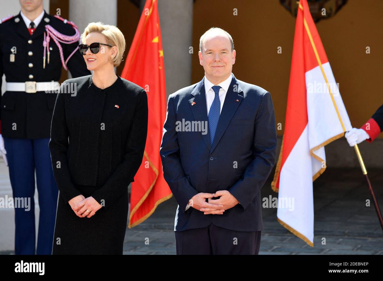 Prince Albert II of Monaco and his wife Princess Charlene wait for ...