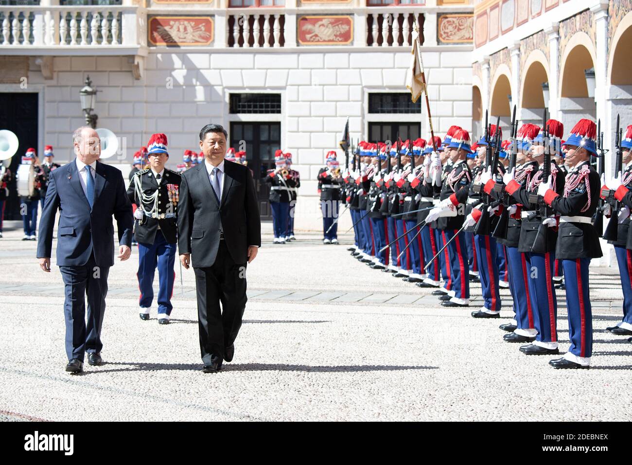 Prince Albert II of Monaco and Chinese President Xi Jinping inspect an ...