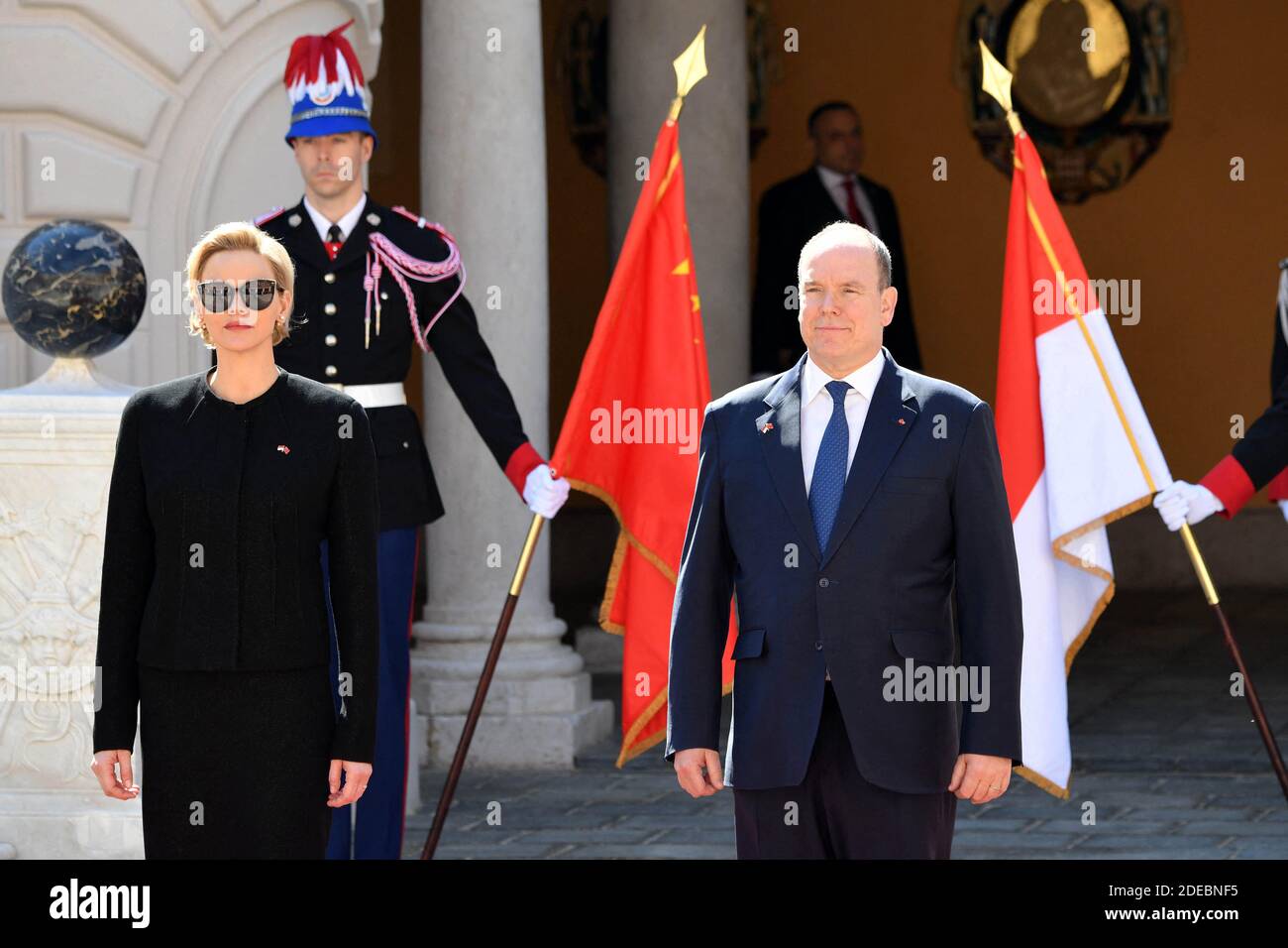 Prince Albert II of Monaco and his wife Princess Charlene wait for ...
