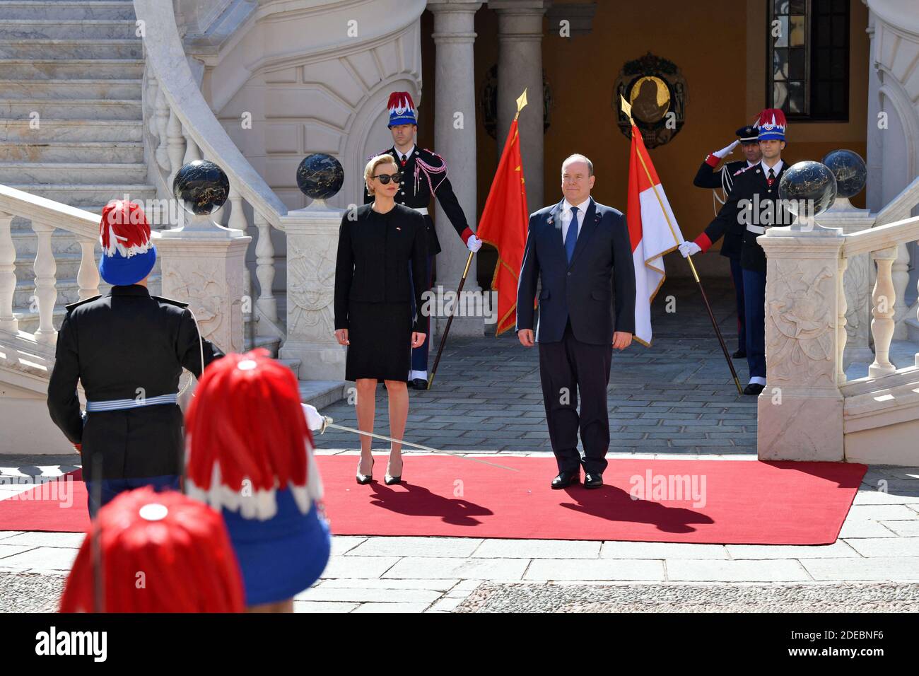 Prince Albert II of Monaco and his wife Princess Charlene wait for ...