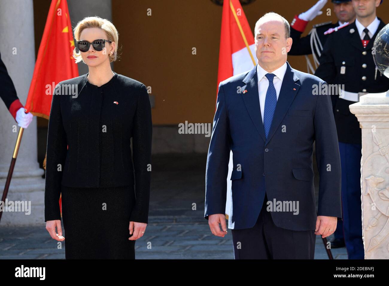 Prince Albert II of Monaco and his wife Princess Charlene wait for ...