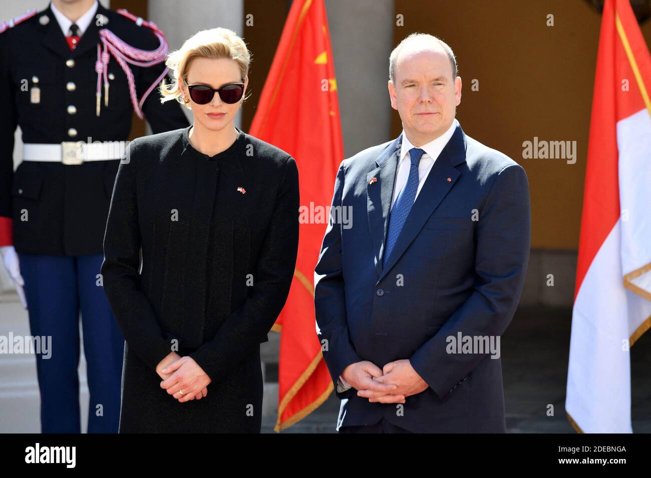 Prince Albert II of Monaco and his wife Princess Charlene wait for ...