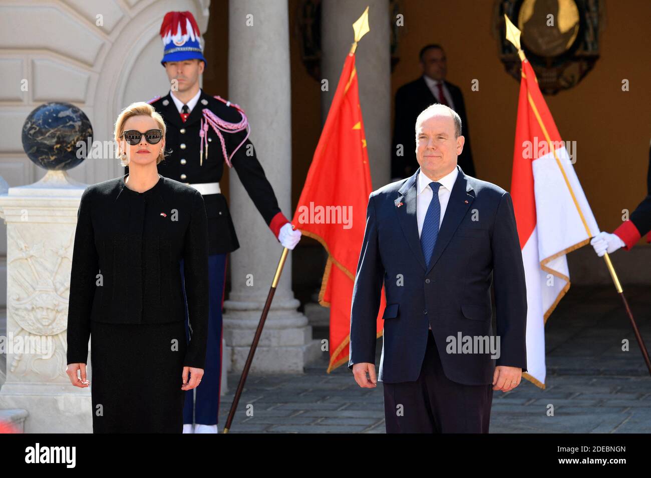 Prince Albert II of Monaco and his wife Princess Charlene wait for ...