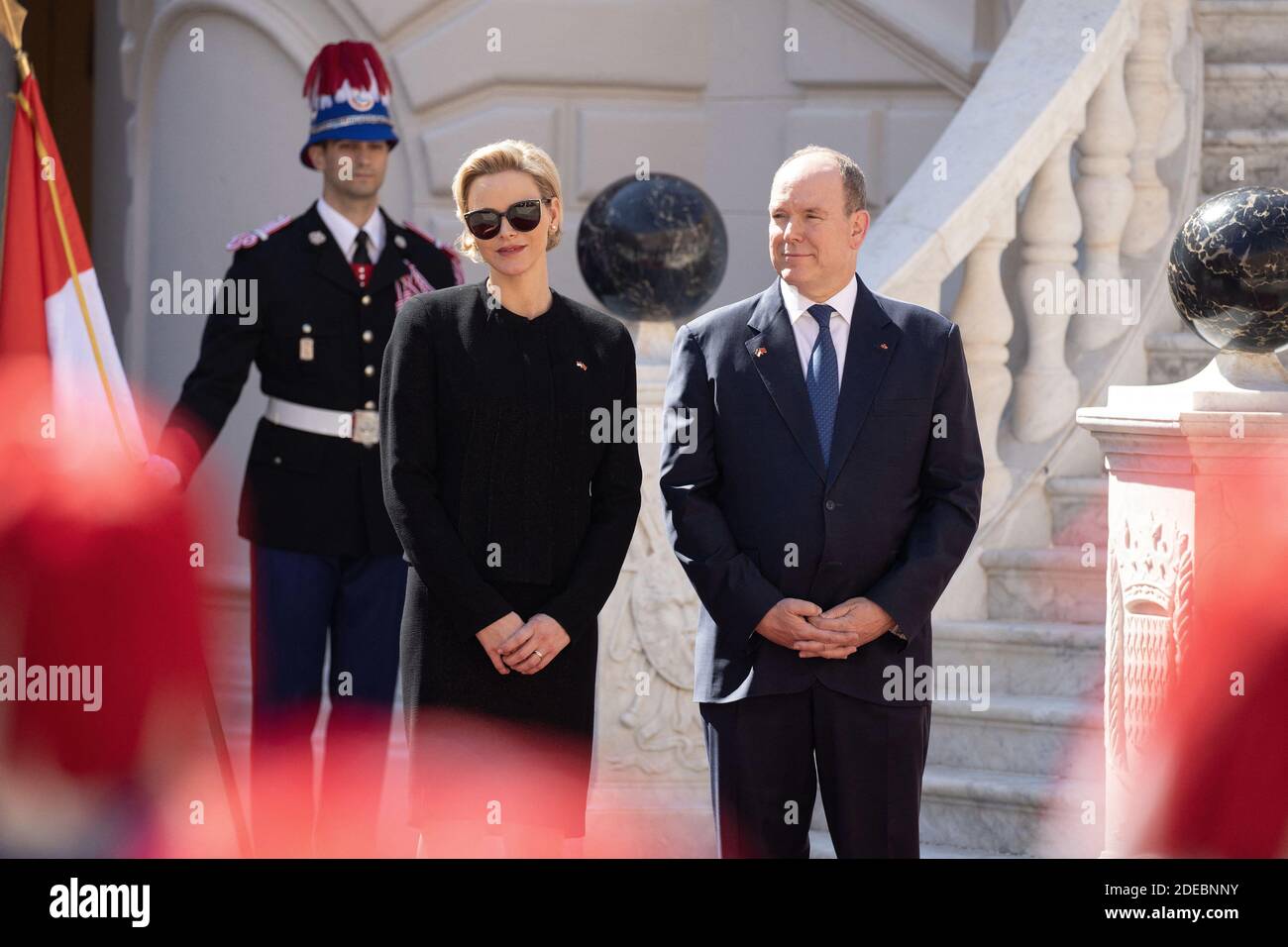Prince Albert II of Monaco and his wife Princess Charlene wait for ...