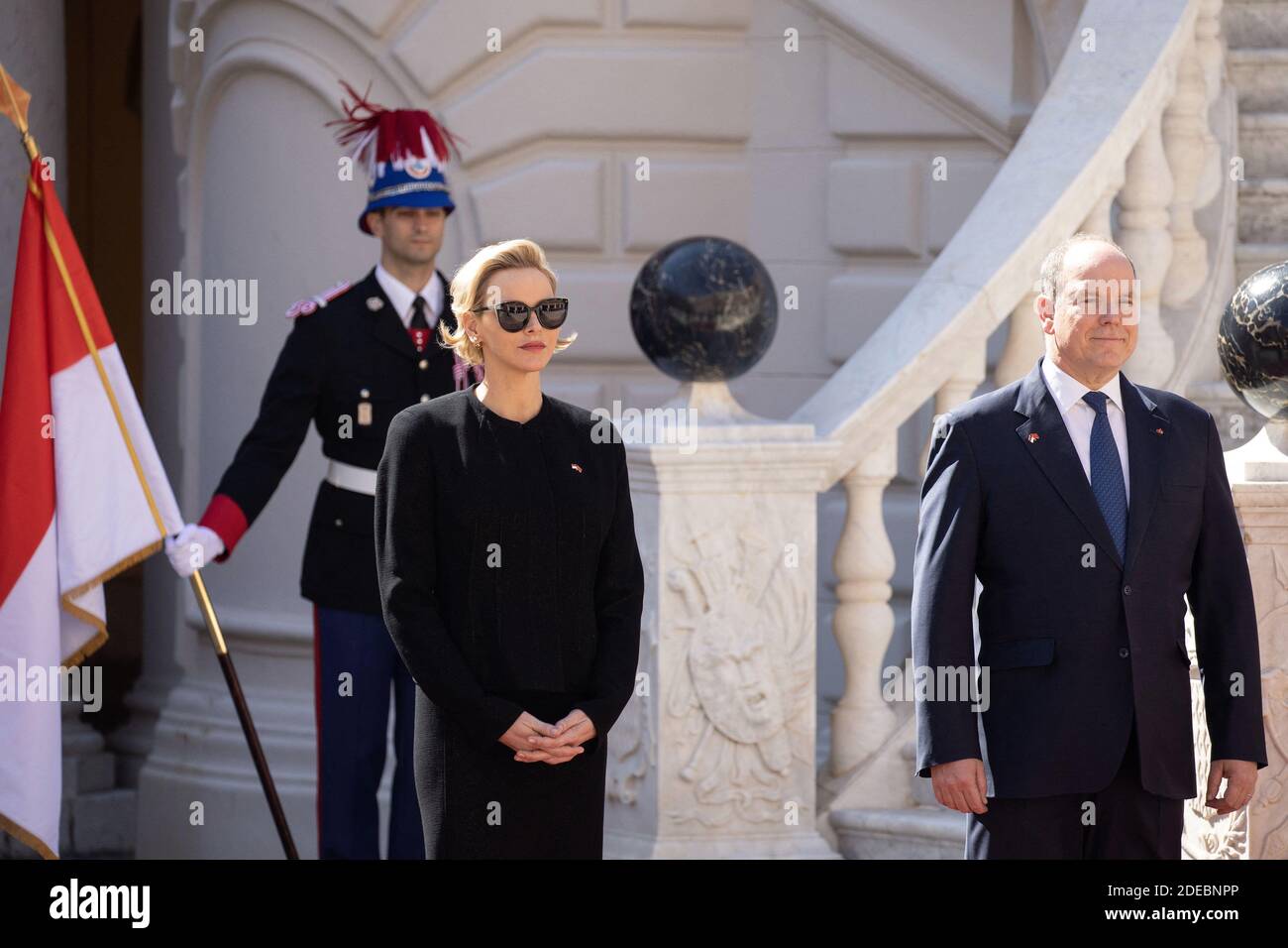 Prince Albert II of Monaco and his wife Princess Charlene wait for ...