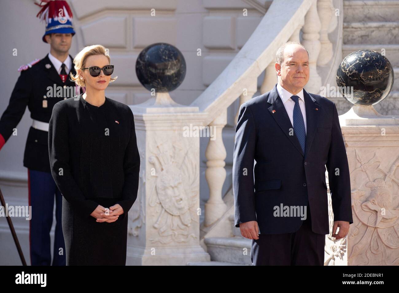 Prince Albert II of Monaco and his wife Princess Charlene wait for ...