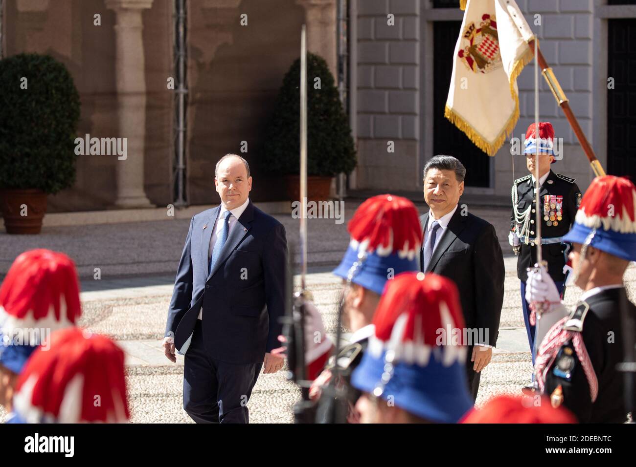 Prince Albert II of Monaco and Chinese President Xi Jinping inspect an ...