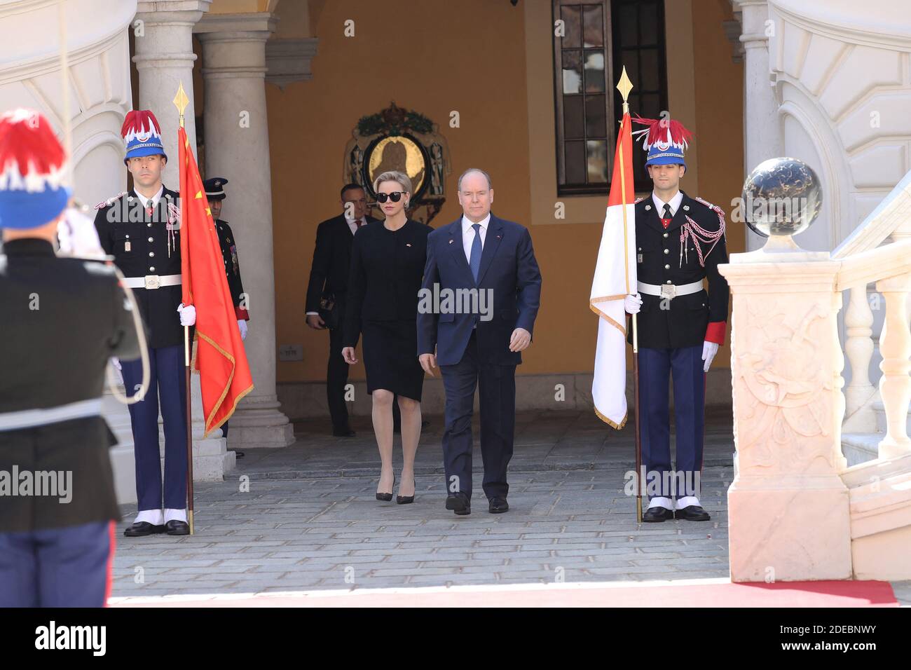 Prince Albert II of Monaco and his wife Princess Charlene wait for ...