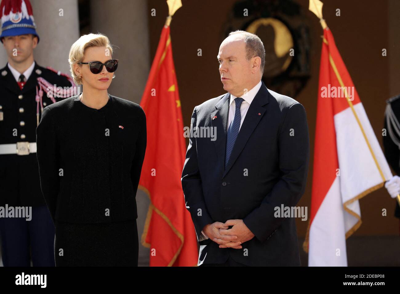 Prince Albert II of Monaco and his wife Princess Charlene wait for ...