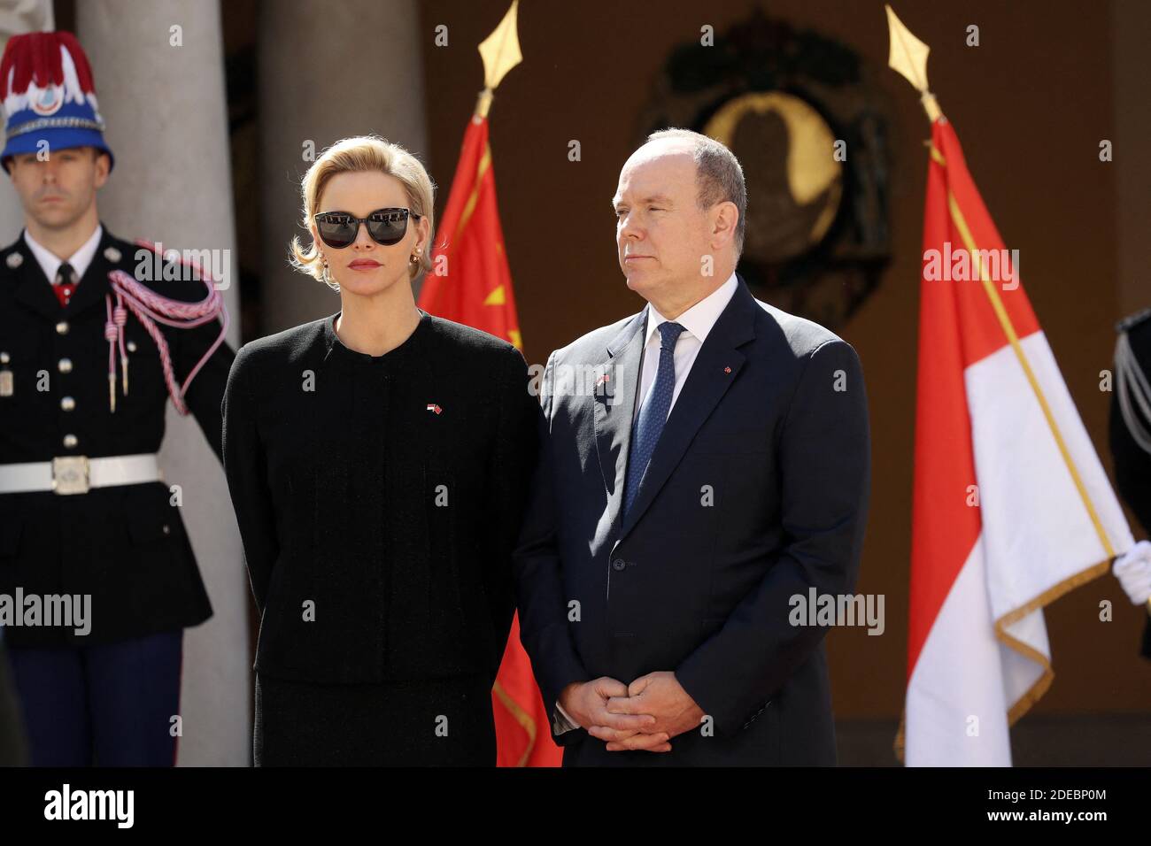 Prince Albert II of Monaco and his wife Princess Charlene wait for ...