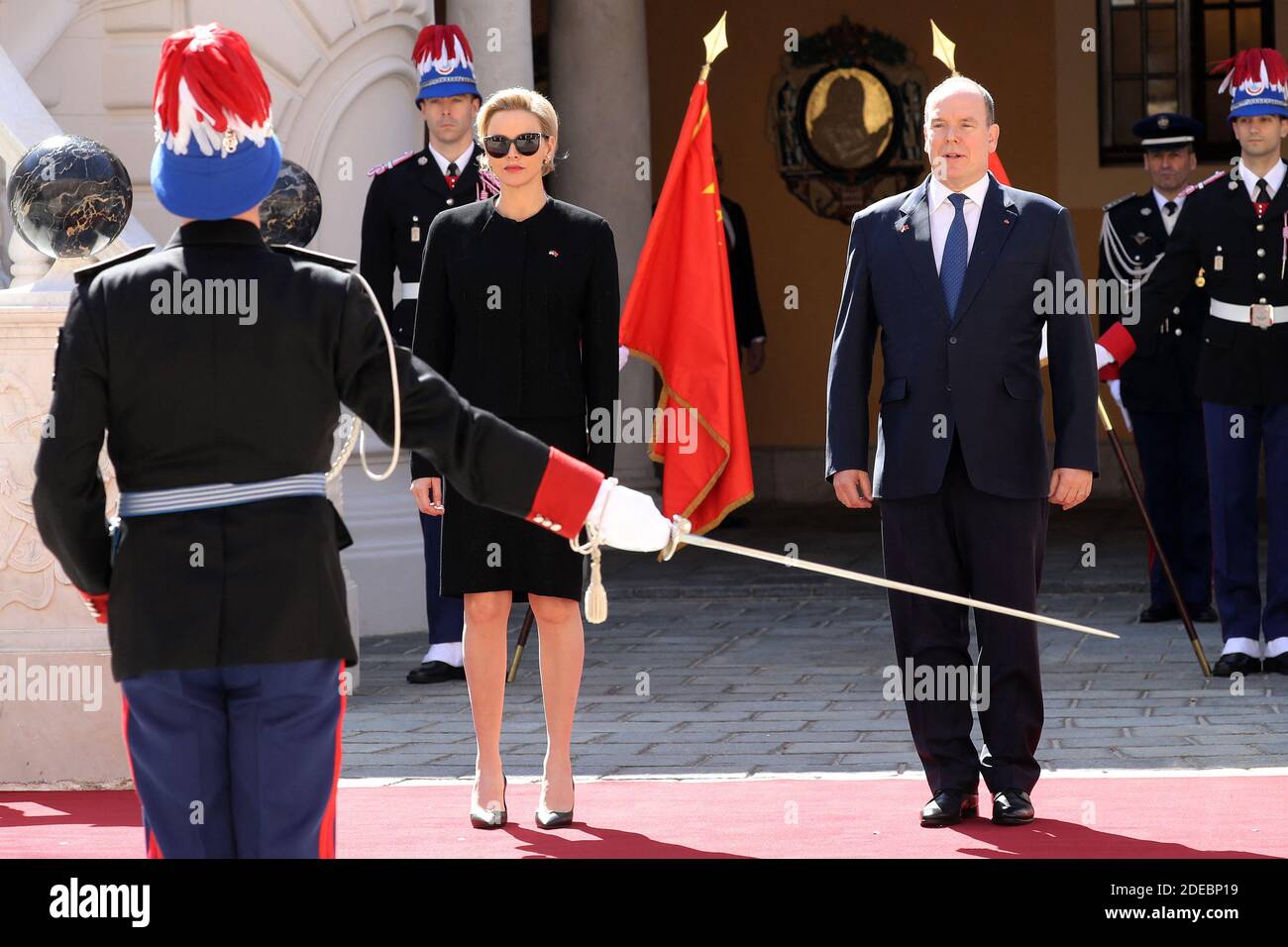 Prince Albert II of Monaco and his wife Princess Charlene wait for ...