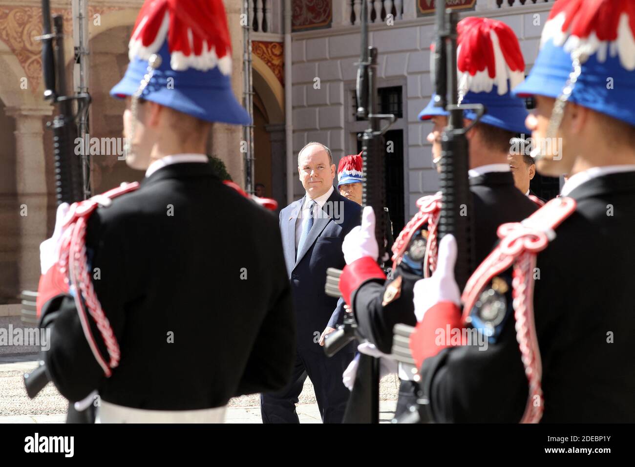 Prince Albert II of Monaco and Chinese President Xi Jinping inspect an ...