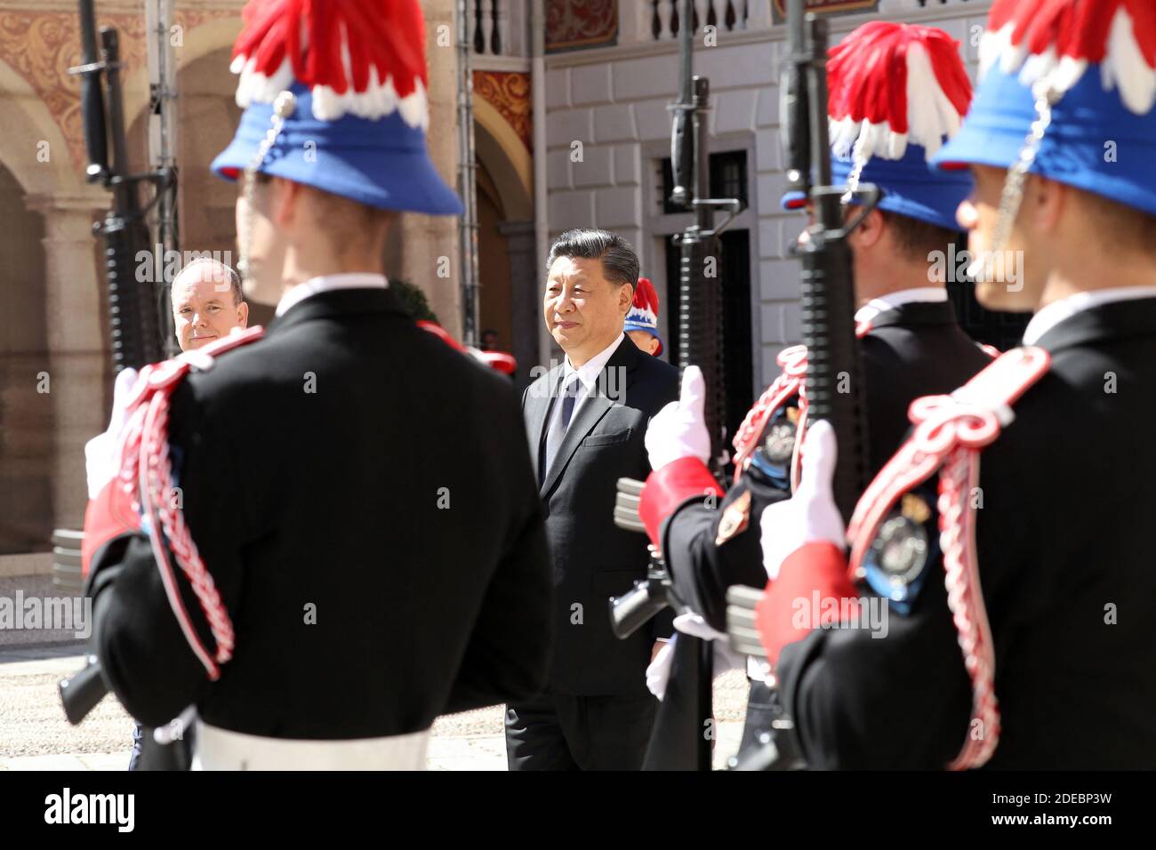 Prince Albert II of Monaco and Chinese President Xi Jinping inspect an ...