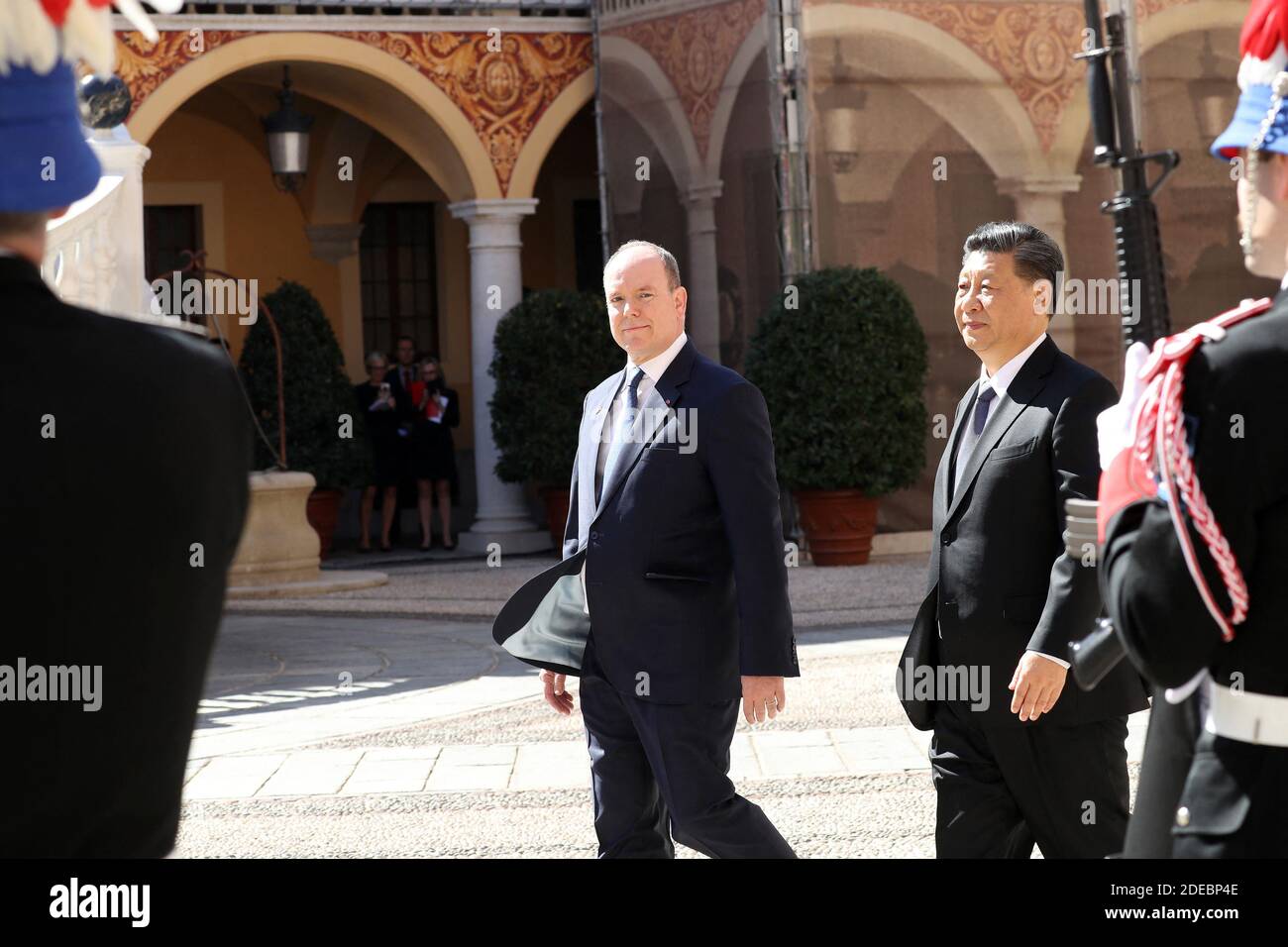 Prince Albert II of Monaco and Chinese President Xi Jinping inspect an ...