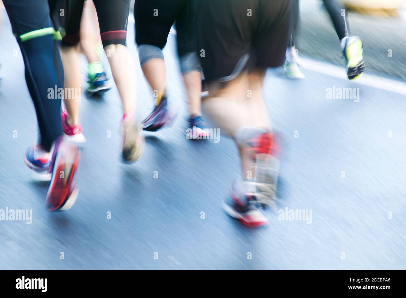 Shooting photos of legs of popular race runners at slow speed Stock ...