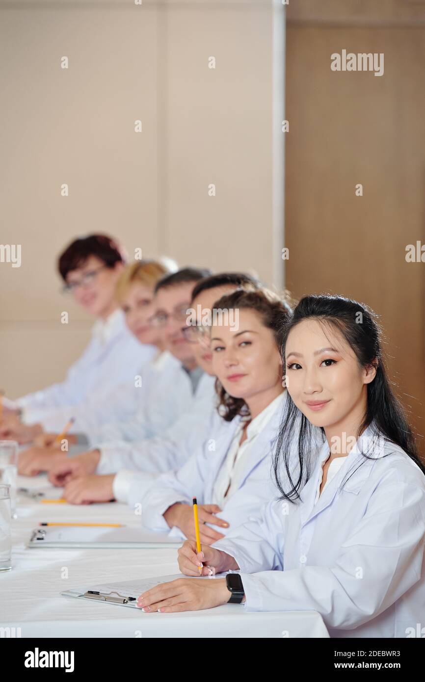 Researchers in boardroom Stock Photo - Alamy
