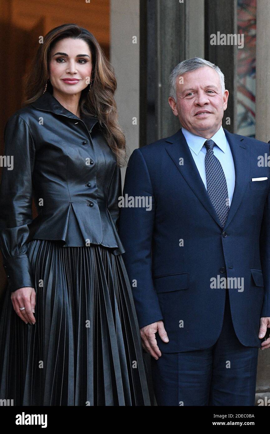 King Abdullah II of Jordan and his wife Queen Rania pose at the Elysee ...