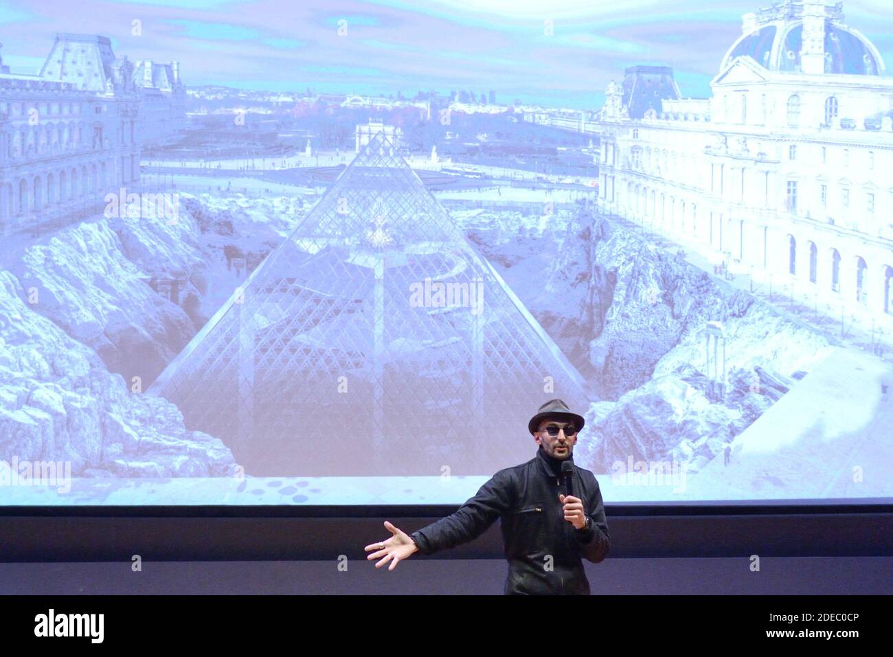 JR attending the 'JR au Louvre & Le Secret de la Grande Pyramide ...
