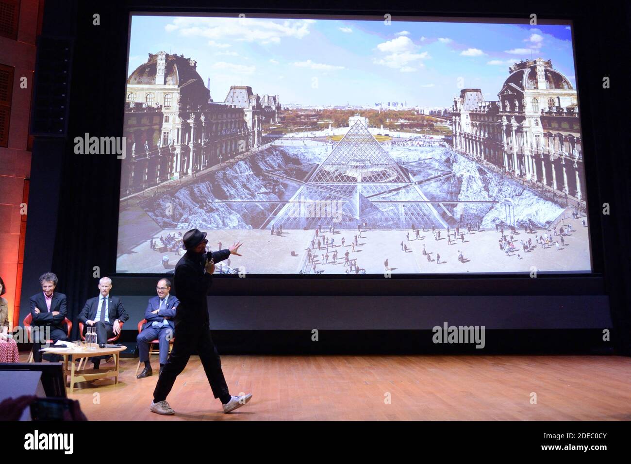 JR attending the 'JR au Louvre & Le Secret de la Grande Pyramide ...