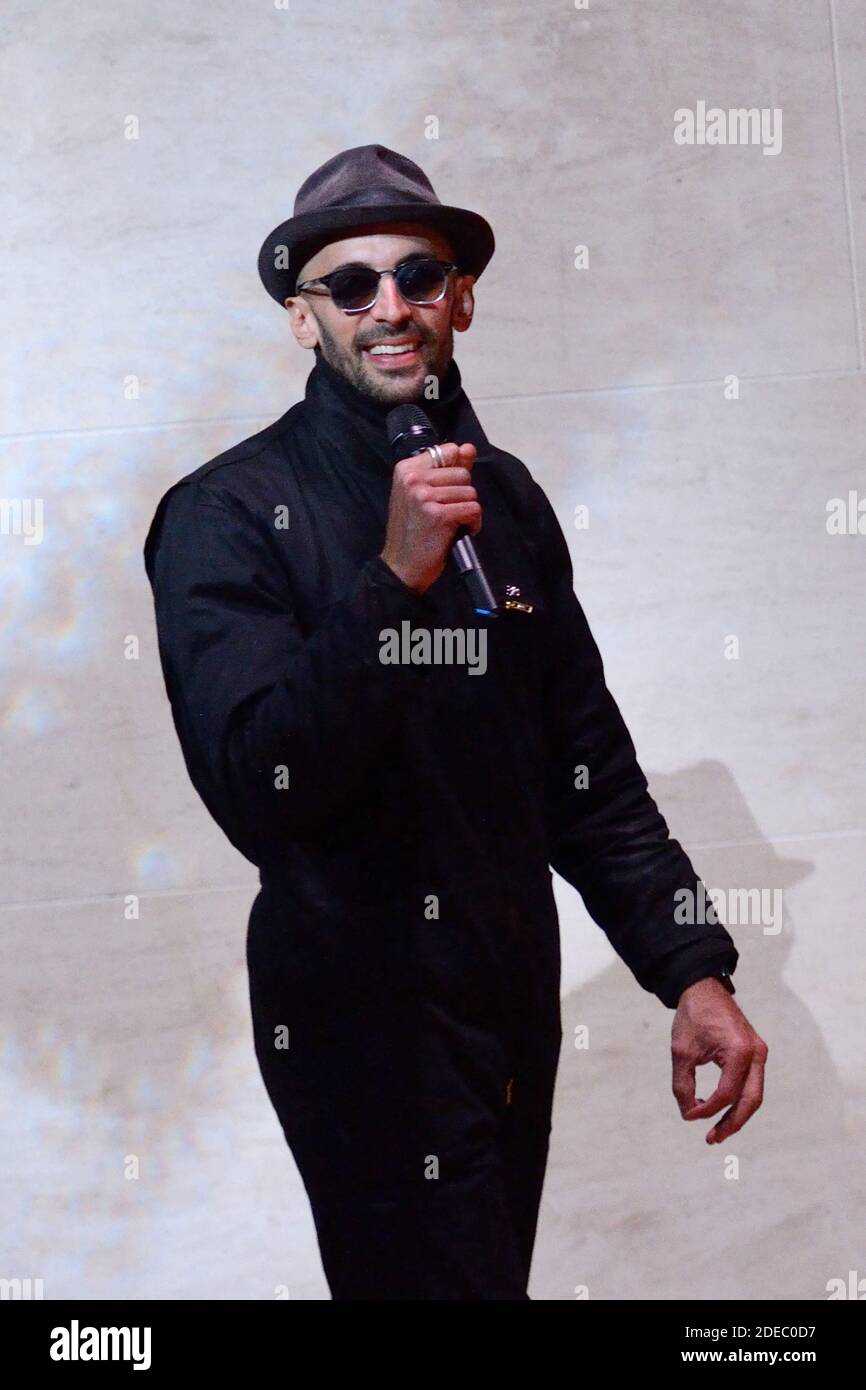 JR attending the 'JR au Louvre & Le Secret de la Grande Pyramide ...