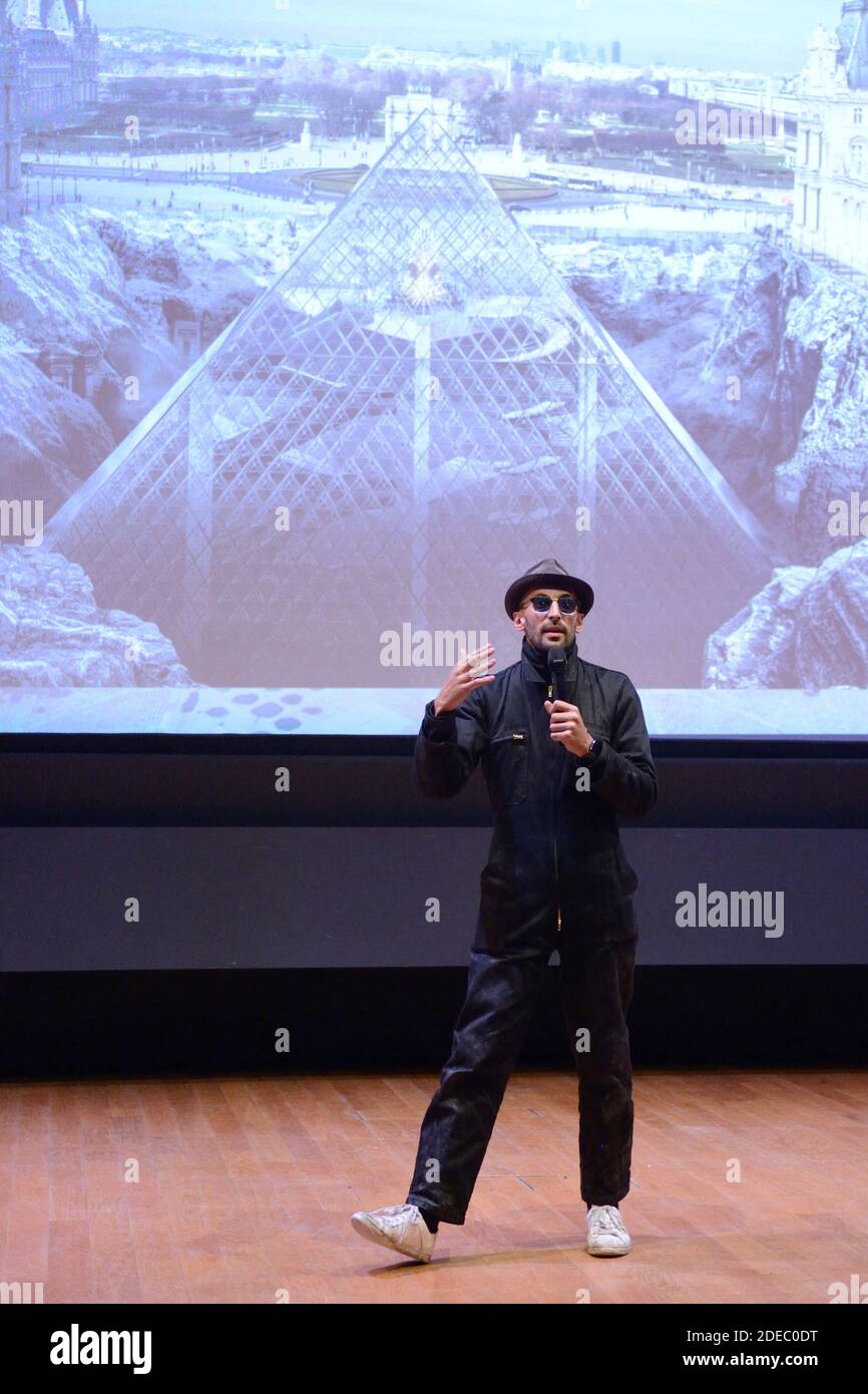 JR attending the 'JR au Louvre & Le Secret de la Grande Pyramide ...