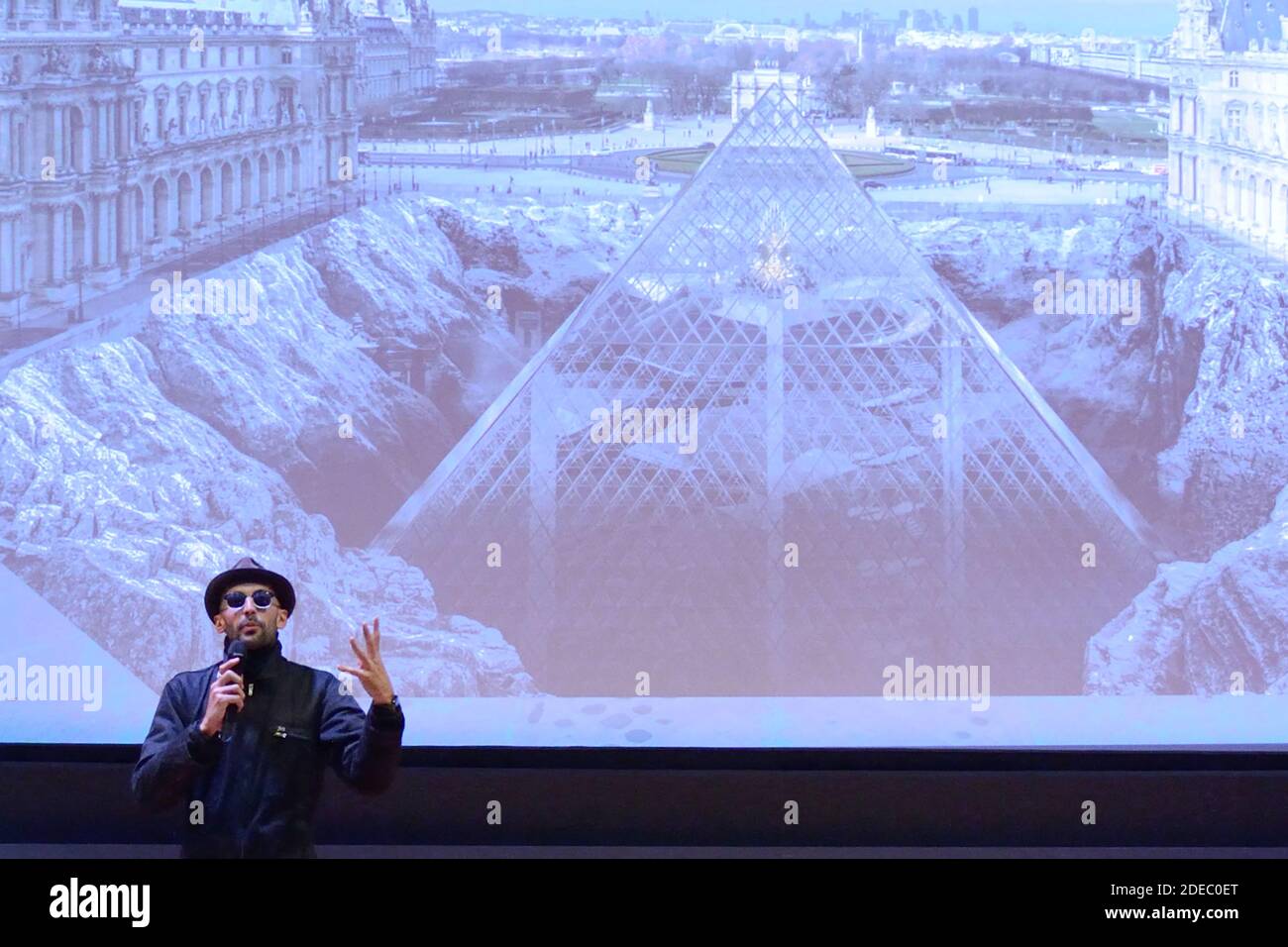 JR attending the 'JR au Louvre & Le Secret de la Grande Pyramide ...