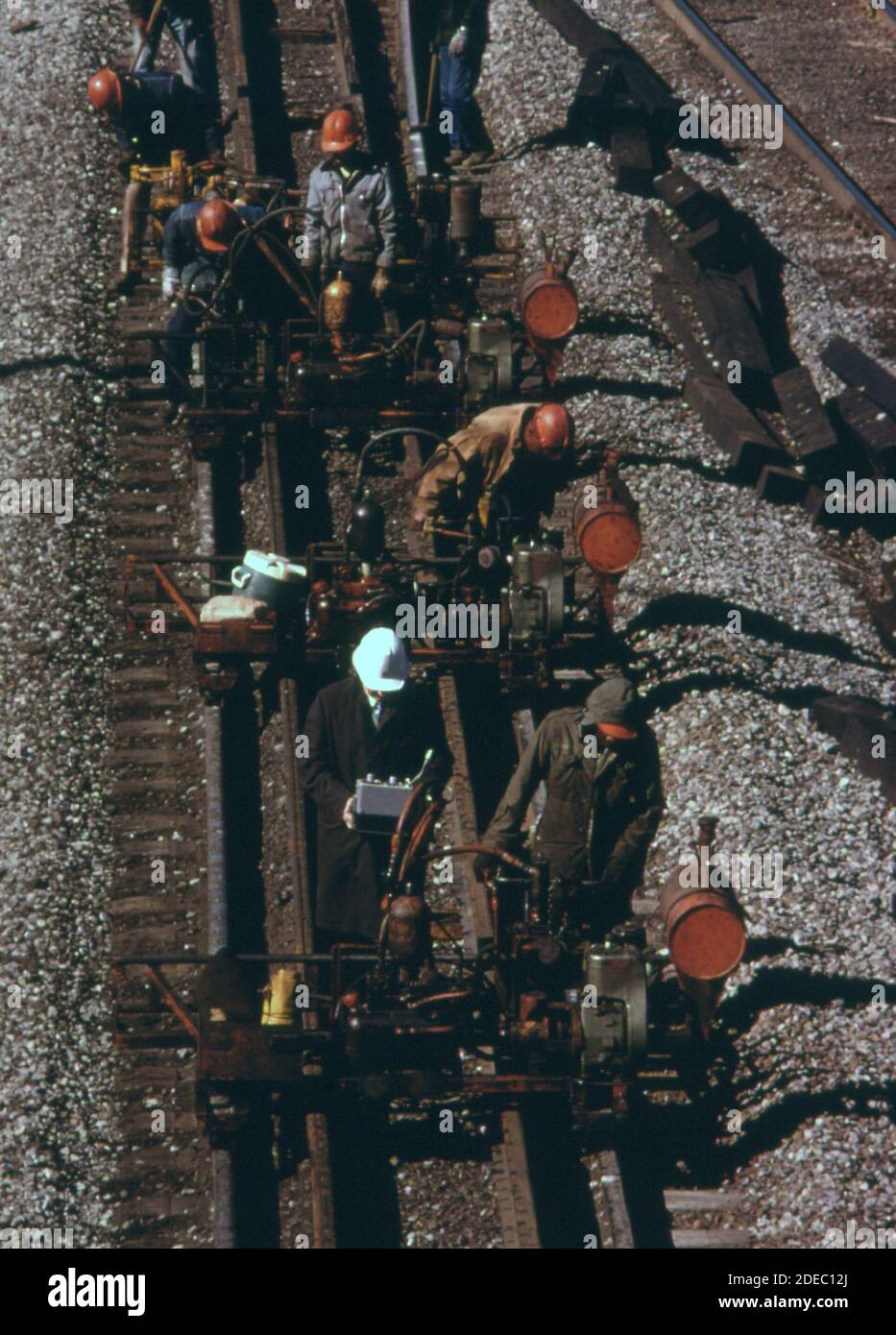 Southern Railway right-of-way work crew with machinery laying new ...