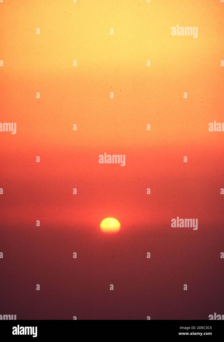 1970s Photos (1972) - Sunset seen through heavy smog Stock Photo - Alamy