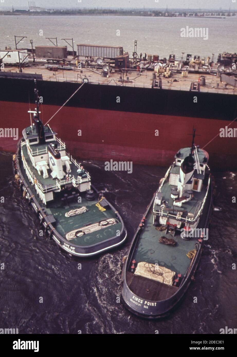 "Towing the newly launched tanker; ""Chevron Hawaii""; to its berth ca ...